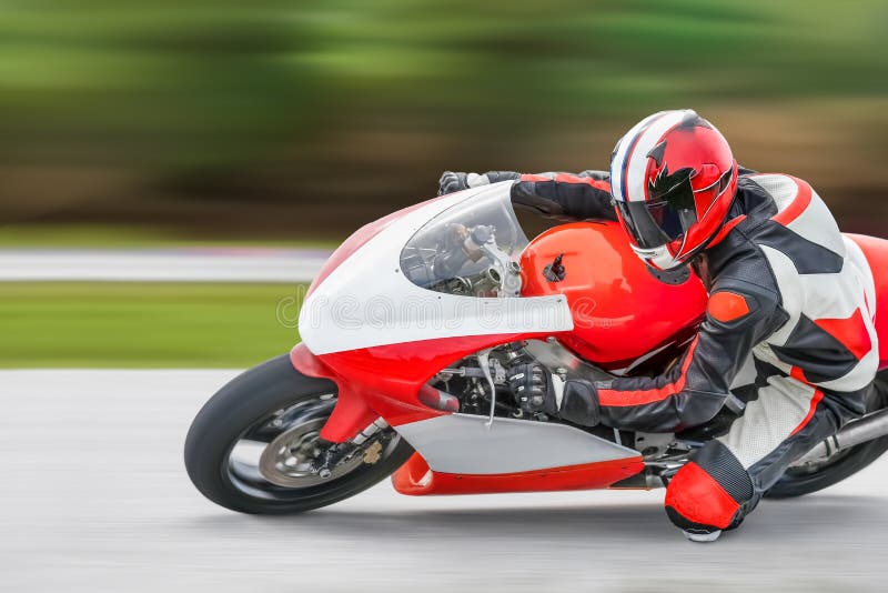 Motorcycle Leaning Into A Fast Corner On Race Track Stock Image - Image ...