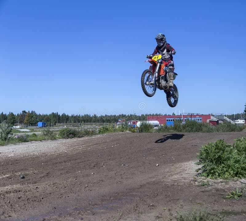Motorcycle rider jumping stock photo. Image of dust, speed - 58599584