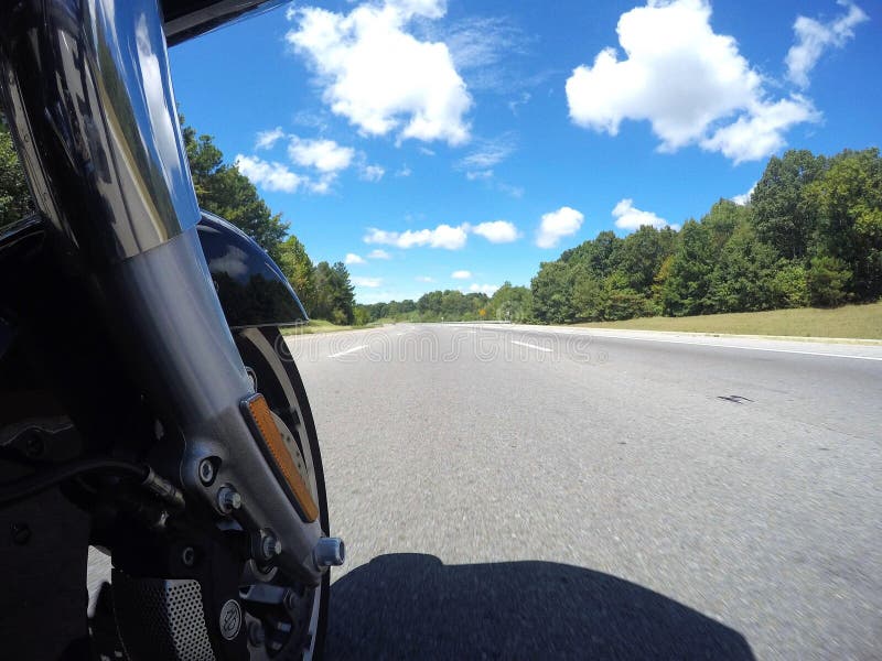 Motorcycle on the Road with Blue Sky Clouds Alone on the Road Stock ...