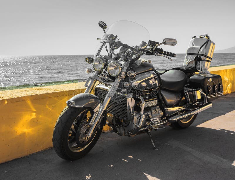 Motorcycle by the sea editorial photo. Image of vacation - 254954396