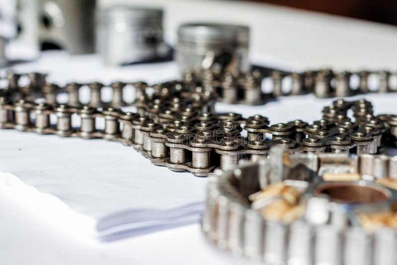 Motorcycle Spare Parts are Placed on a White Table To Study and Design ...