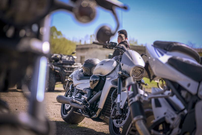 Motorcycle Standing among People at a Biker Show Editorial Photo ...