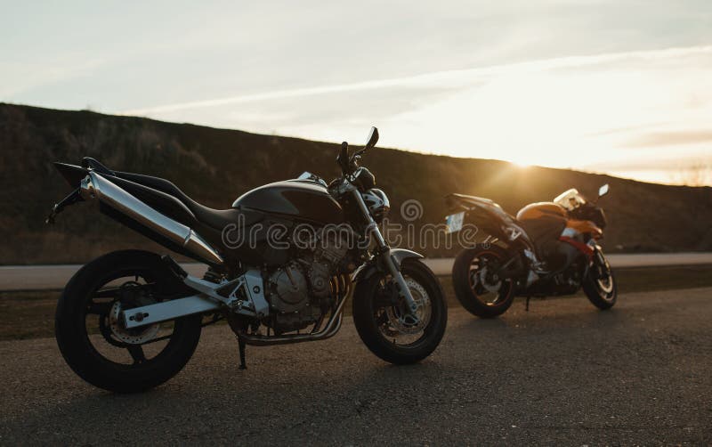 Motorcycle on sunset stock photo. Image of acceleration - 90682042