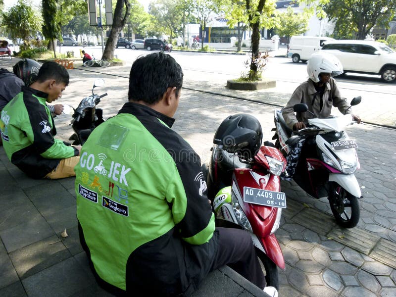 Motorcycle taxi driver editorial stock image. Image of solo - 72815679