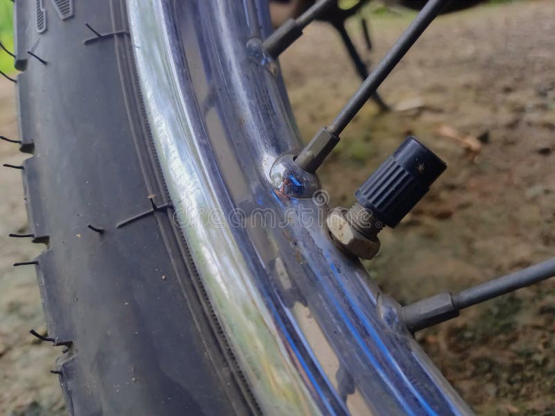 Motorcycle tire valve. stock photo. Image of blue, iron - 220432052