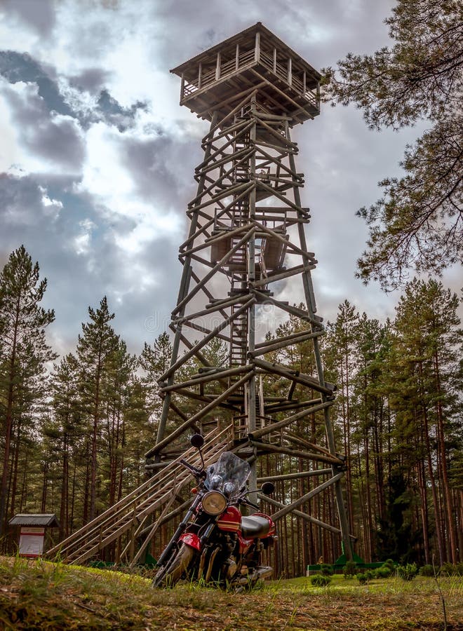 Motorcycle Under Wooden Tower Stock Photos - Free & Royalty-Free Stock ...