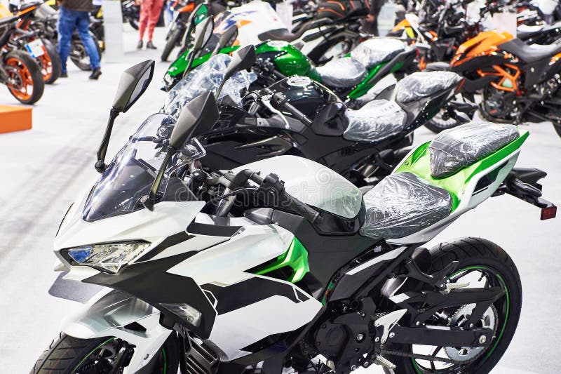 Motorcycles in the store stock image. Image of sale - 318036989
