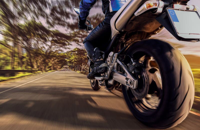 Motorbike Riding Country Road through Trees and Fields Stock Image ...
