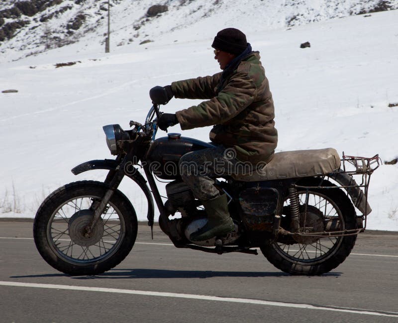 Motorcyclist in retro-bike stock photo. Image of extreme - 18330394