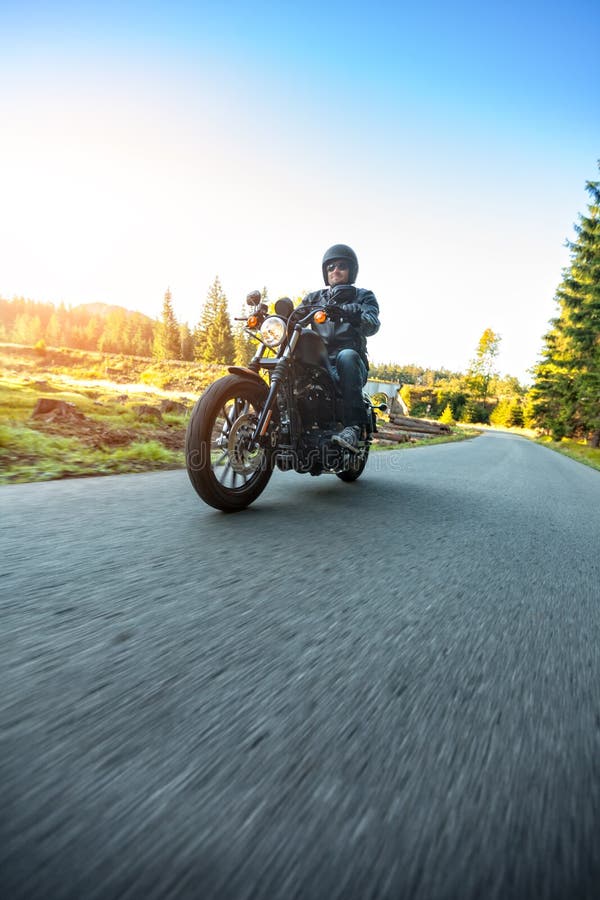 Motorcyclist Riding Chopper on a Road Stock Image - Image of male ...