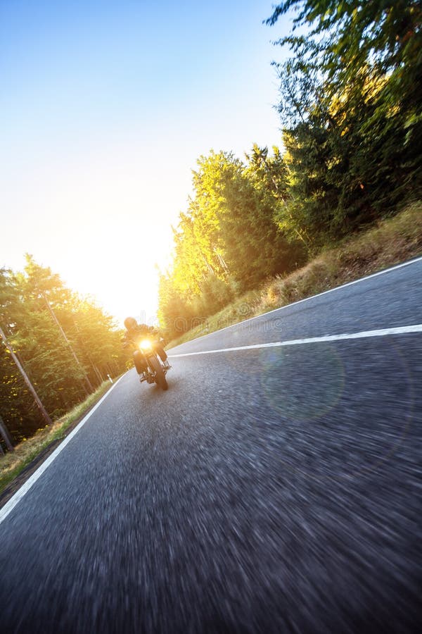 Motorcyclist Riding Motorbike in Sunny Morning Stock Photo - Image of ...
