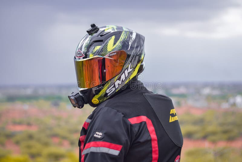 Motorcyclist Wearing a Riding Jacket and SMK Helmet Editorial Image ...