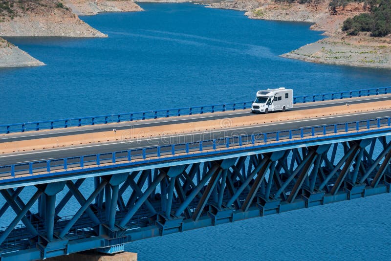 Motorhome Driving Over a Bridge Over a Blue Water Swamp Stock Photo ...