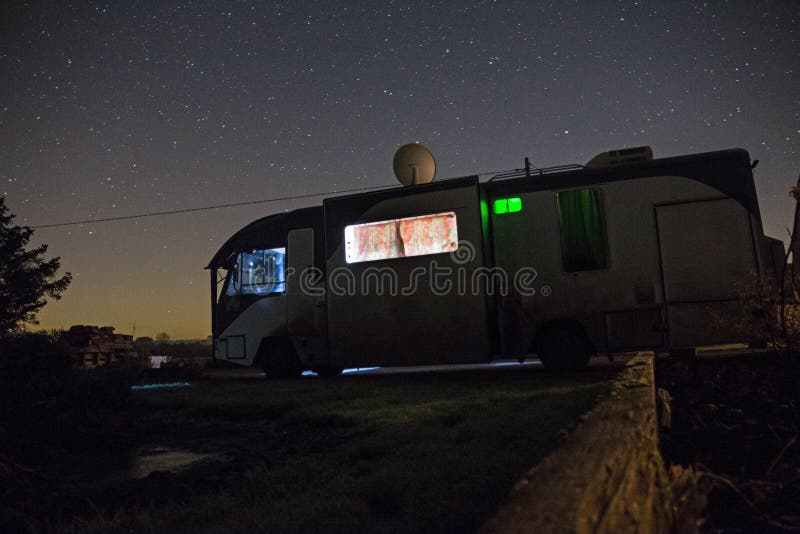 Motorhome at night stock image. Image of trucking, truck - 194658075