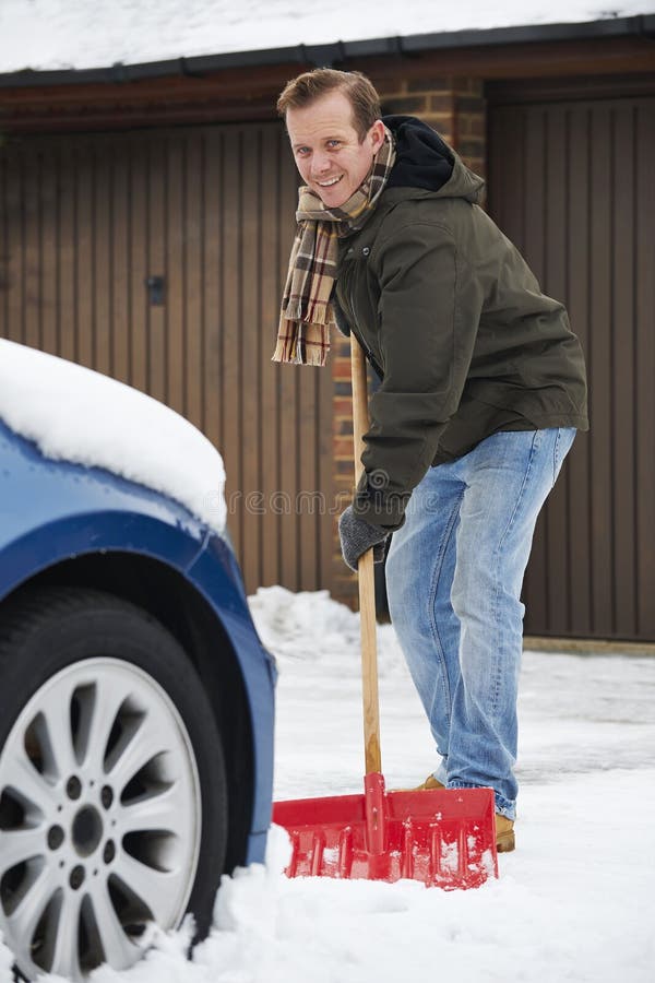 Motorist Digging Car Out of Snow Stock Photo - Image of snow, people ...