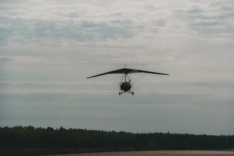 The Motorized Hang Glider Ready To Landing Stock Image - Image of hang ...