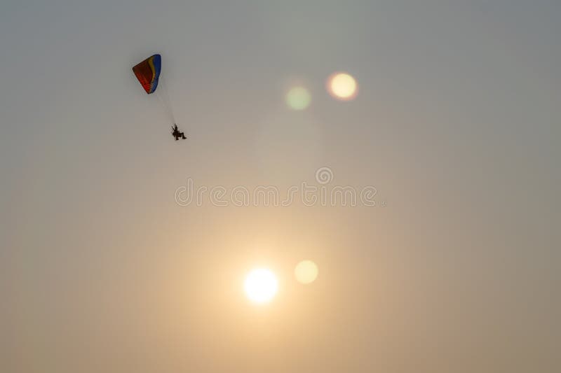 Motorized parafoil glider stock image. Image of paragliding - 291229419