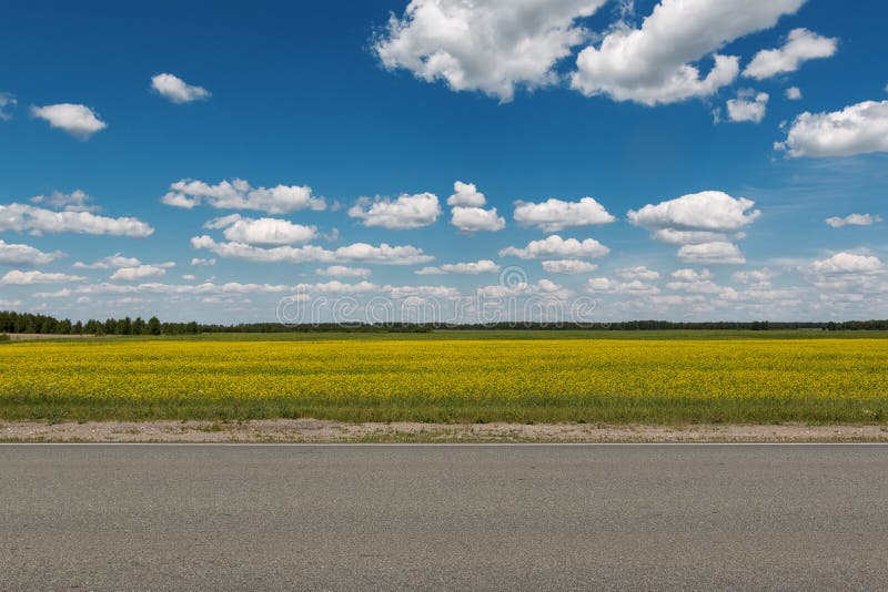Motorway Behind Which the Blue Sky with Clouds Over the Field Wi Stock ...