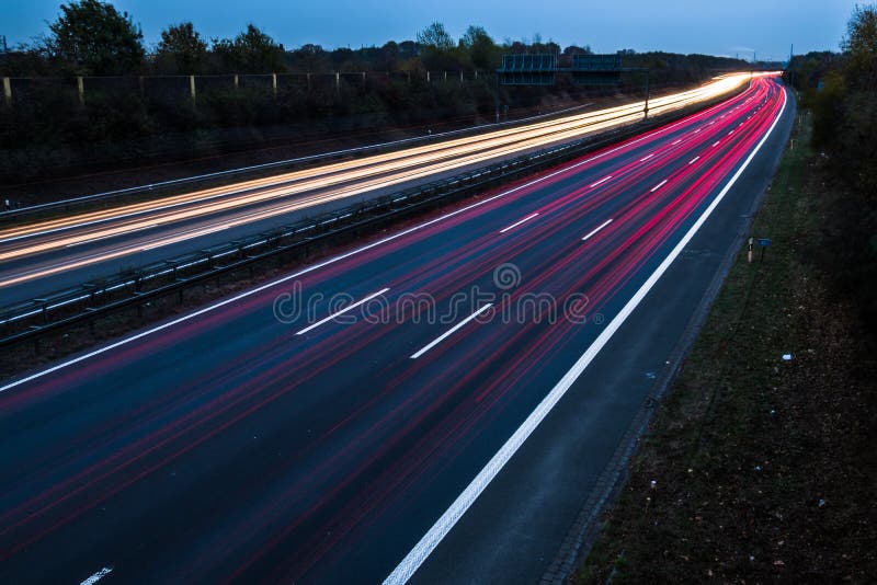 Motorway at Night with Fast Moving Cars Stock Image - Image of street ...
