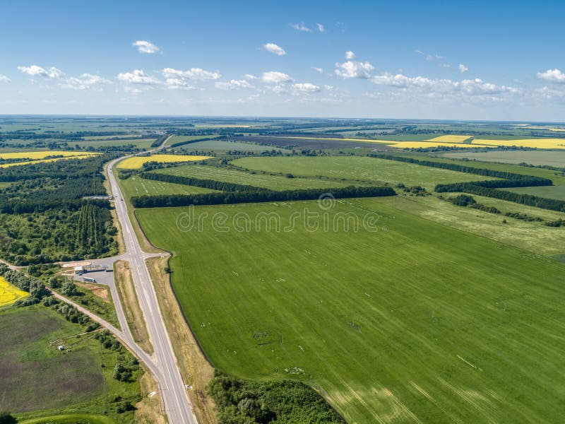 The Motorway Runs through Green Fields. Aerial View Stock Photo - Image ...