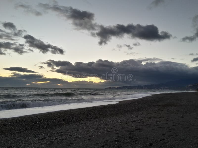 Motril beach stock image. Image of clouds, blue, beach - 50510441