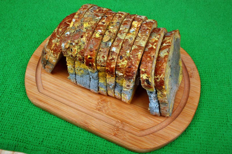Loaf of mouldy brown bread stock image. Image of colorful - 1158573