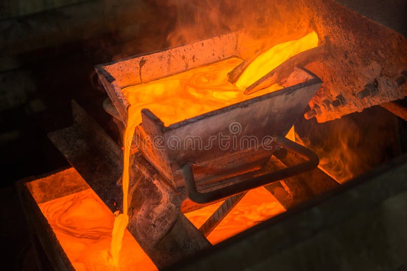 Moulting gold at a factory stock photo. Image of furnace - 80923912