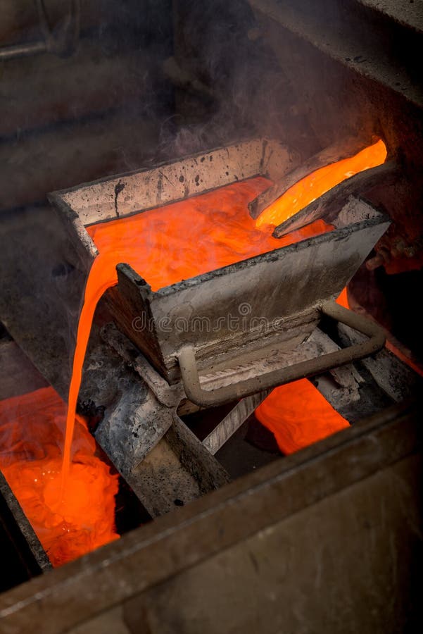 Moulting gold at a factory stock image. Image of flow - 80923921