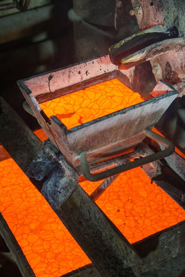 Moulting gold at a factory stock image. Image of melting - 80923955