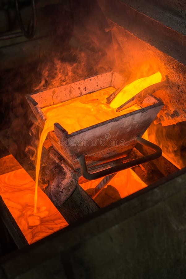Smelting gold at a factory stock photo. Image of bright - 80995222