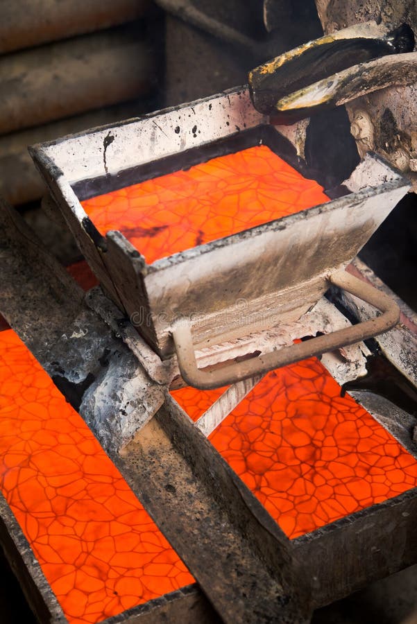 Moulting gold at a factory stock image. Image of flow - 81027543