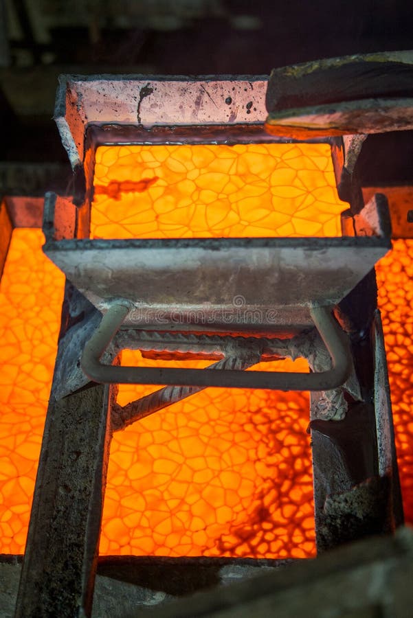 Moulting gold at a factory stock image. Image of flow - 81527647