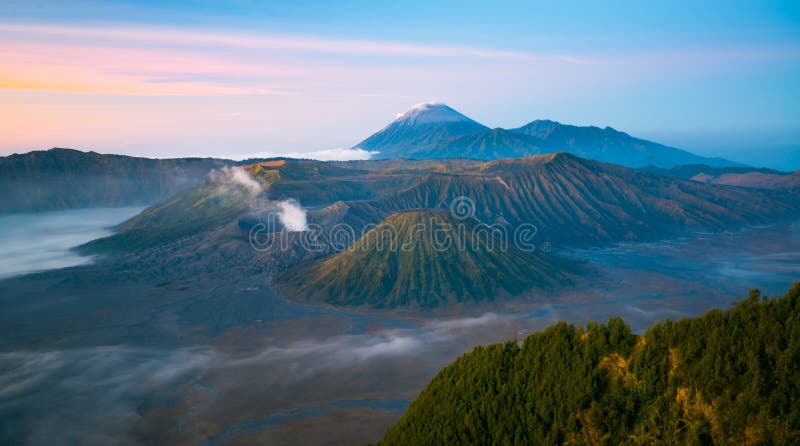 Mount Bromo while Sunrise with Fog Stock Image - Image of idyll, rural ...