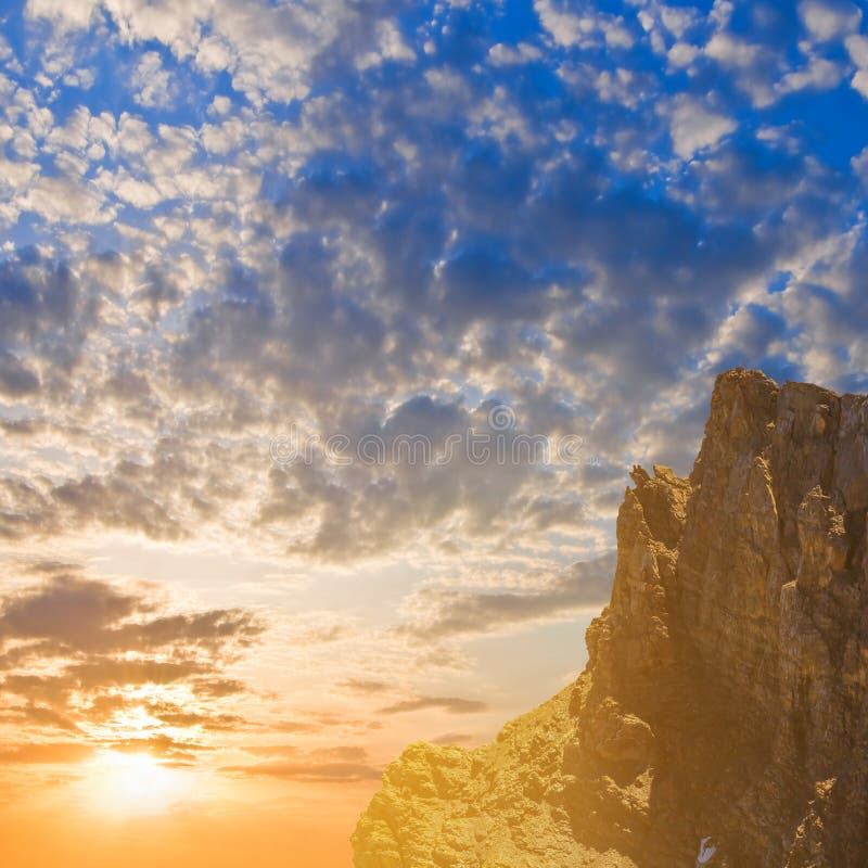 Mount Cliff in Clouds at the Sunset Stock Photo - Image of light ...