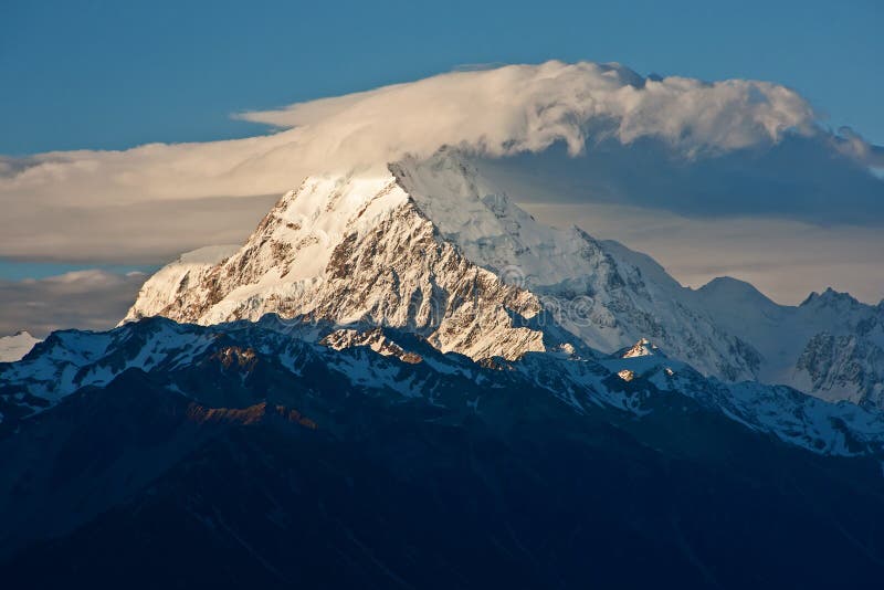 Mount Cook in Evening Light with Clouds on Summit Stock Photo - Image ...