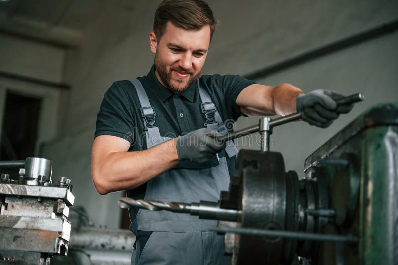 With the Mount in Drill. Man in Uniform is in Workstation Developing ...