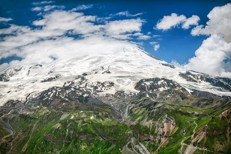 Mount Elbrus in clouds stock photo. Image of flora, bright - 57312702