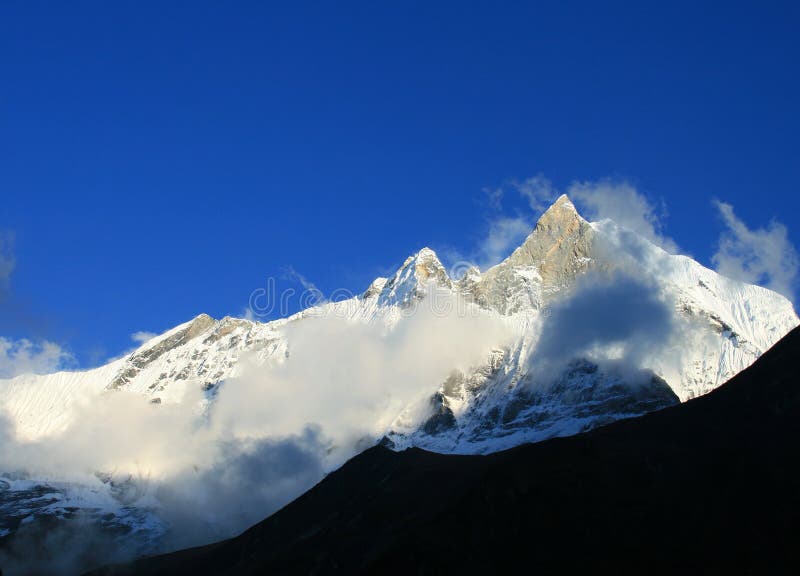 Mount Machhapuchhare, the Fish Tail, in Evening Clouds, Pokhara, Nepal ...