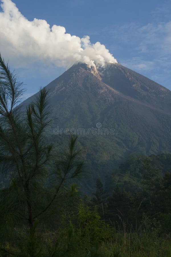 Mount Merapi when Emitting Solfatara Smoke. Blurry and Grainy Textured ...