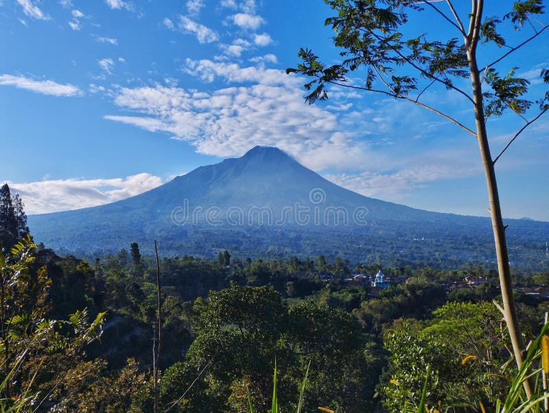 Mount Merapi Under the Blue Sky Stock Photo - Image of blue, merapi ...