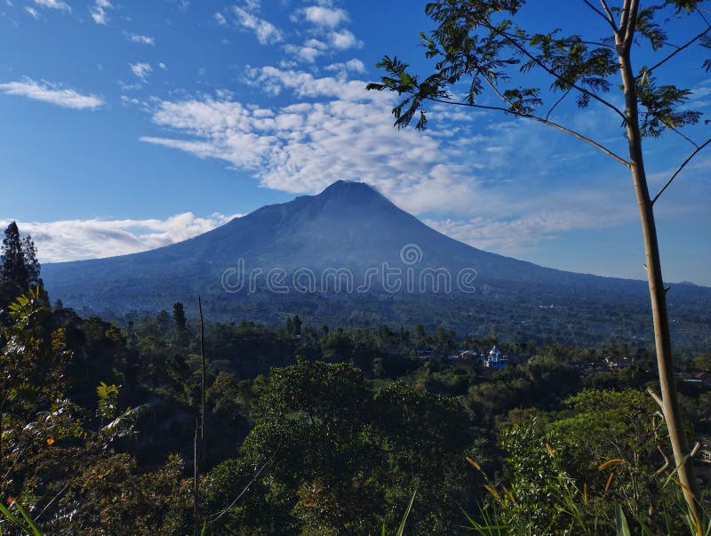 Mount Merapi Under the Blue Sky Stock Image - Image of white, mount ...