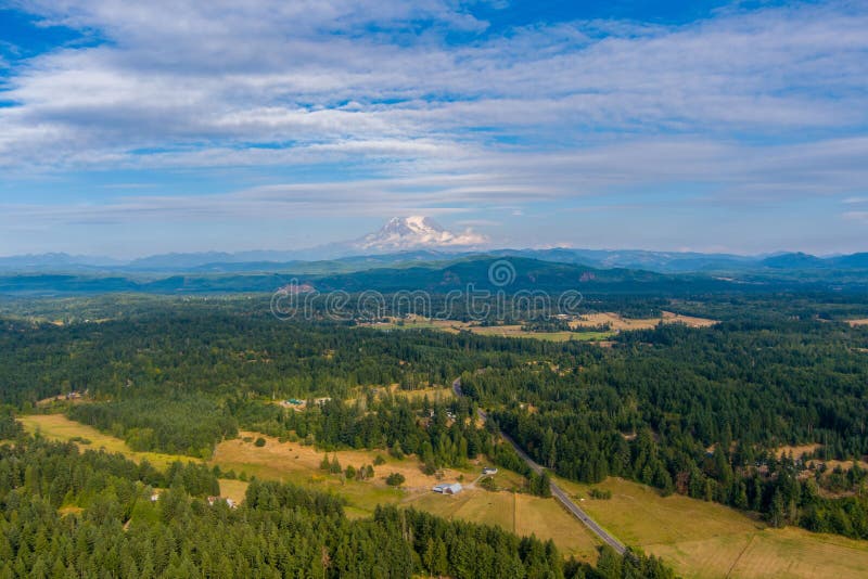 Mount Rainier on the Horizon in August Stock Image - Image of horizon ...