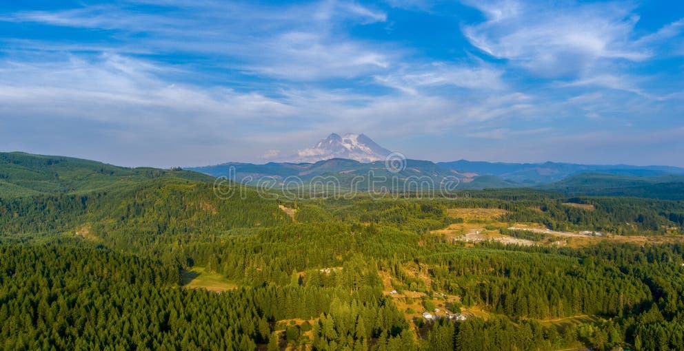 Mount Rainier on the Horizon in August Stock Photo - Image of outdoors ...
