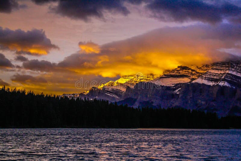 Mount Rundle in Early Morning Light Stock Photo - Image of bushes ...