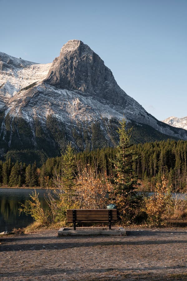 Mount Rundle with Wooden Bench on Rundle Forebay in Autumn at Canmore ...