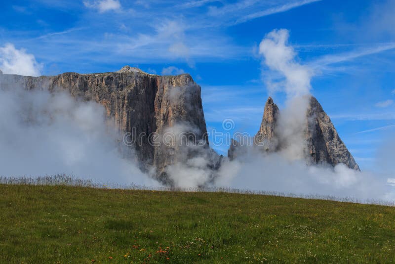 Mount Sciliar between the Clouds Stock Image - Image of clouds, siusi ...