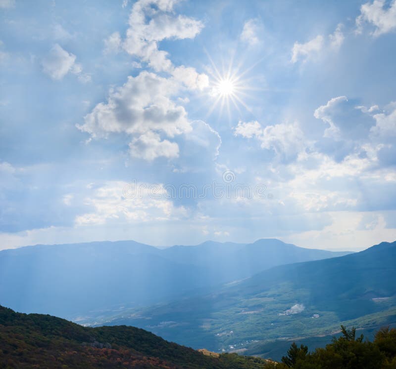 Mount Slope in a Dense Clouds and Light of Sun Stock Photo - Image of ...