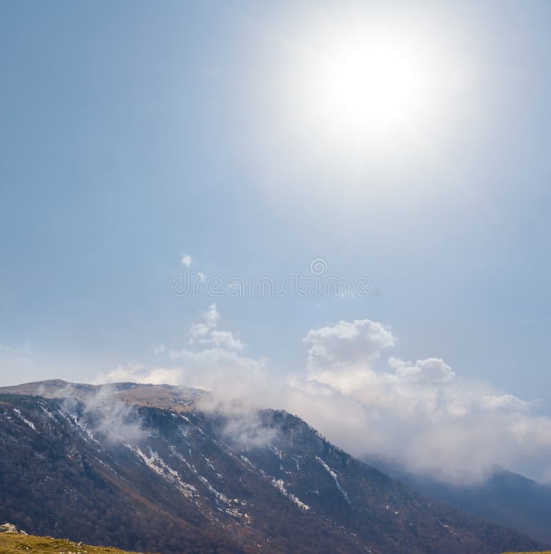 Mount Slope in a Dense Clouds Stock Photo - Image of glow, cumulus ...