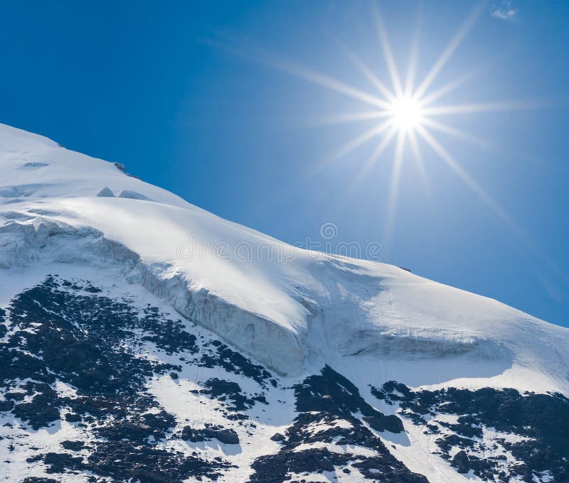 Mount Slope Under a Sparkle Sun Stock Image - Image of blue, serene ...