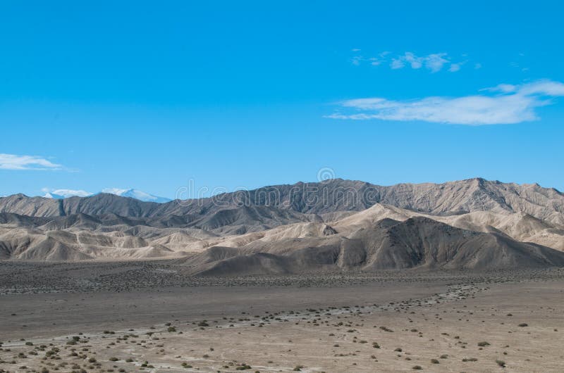 Mountain altun tagh stock image. Image of glow, cars - 254073575